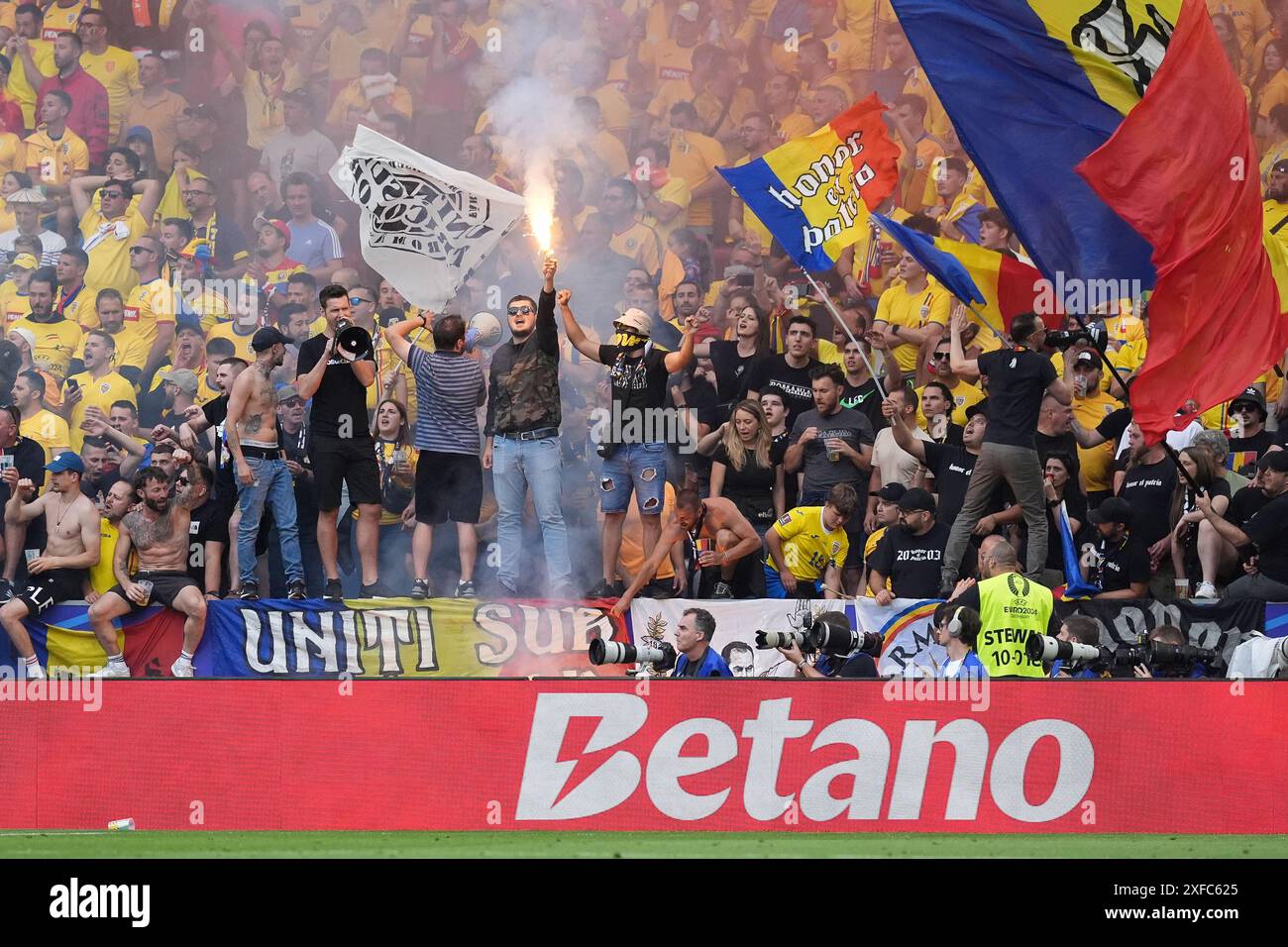 Romania fans with flares in the stands during the UEFA Euro 2024, round ...