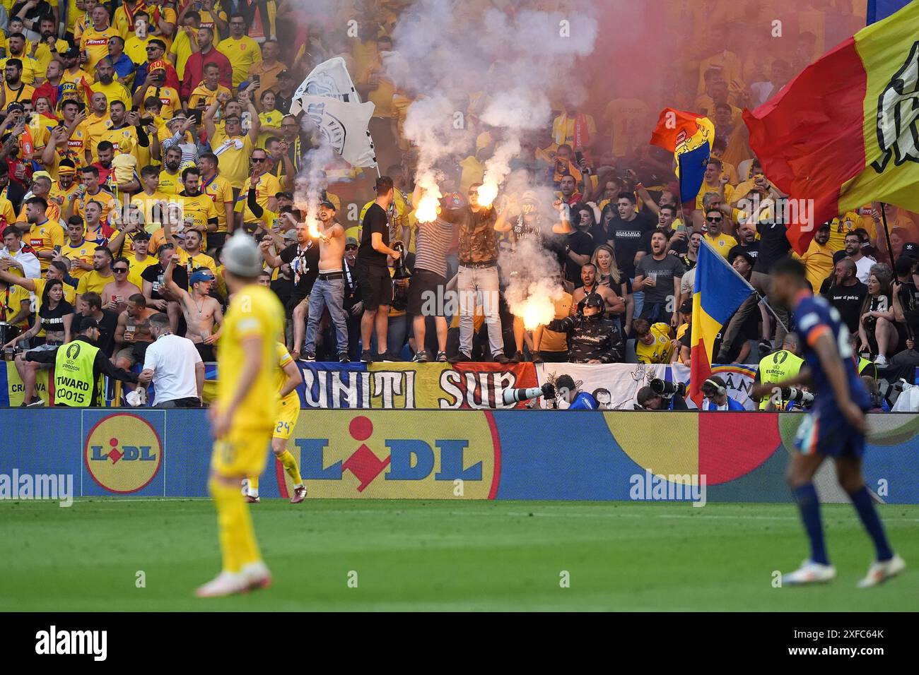 Romania fans with flares in the stands during the UEFA Euro 2024, round ...
