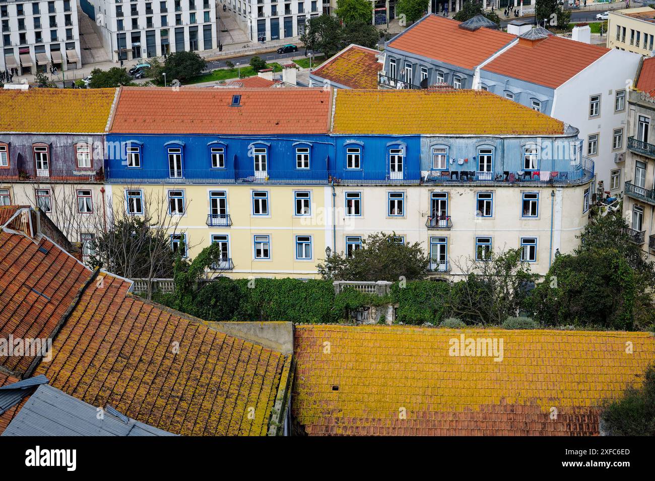 Aerial view of a colorful apartment building with a blue and yellow ...