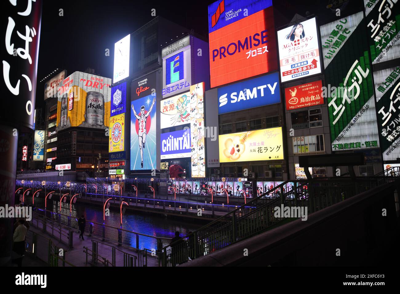 Night view of the canal in Dotonbori, one of Osaka's principal tourist ...