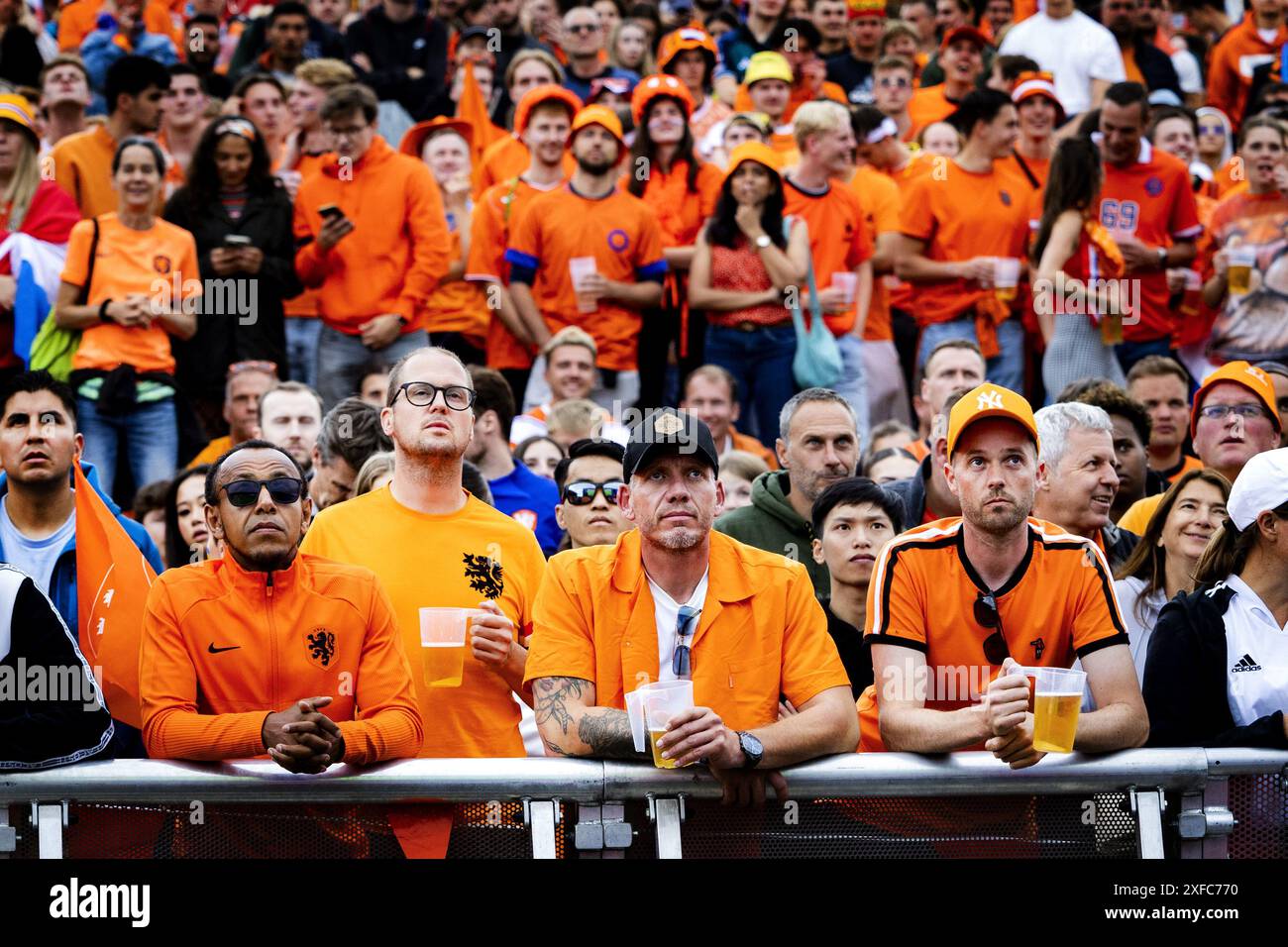 MUNICH - Dutch fans watch the eighth final match at the European ...