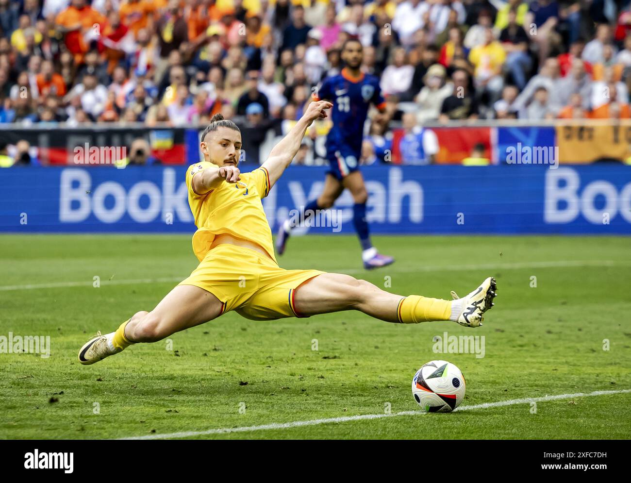 MUNICH - Radu Dragusin of Romania during the UEFA EURO 2024 round of 16 ...
