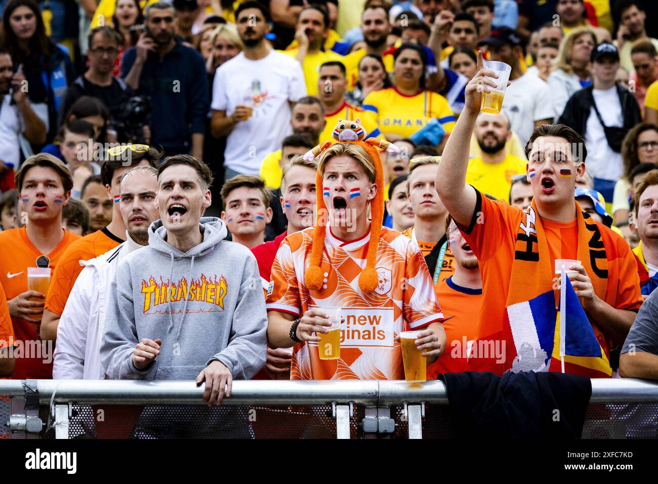 MUNICH - Dutch fans watch the eighth final match at the European ...