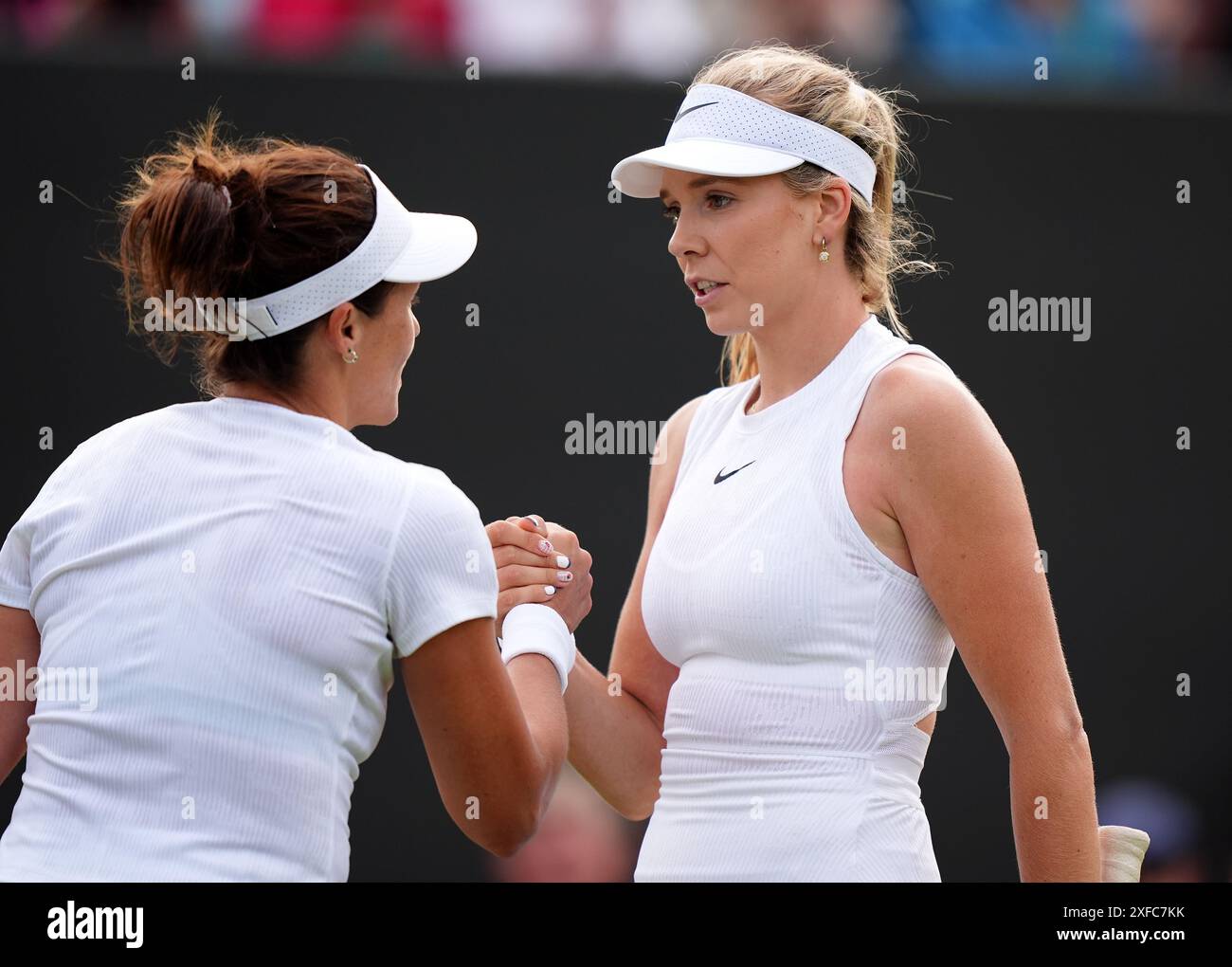 Katie Boulter and Tatjana Maria (left) after their match on day two of ...