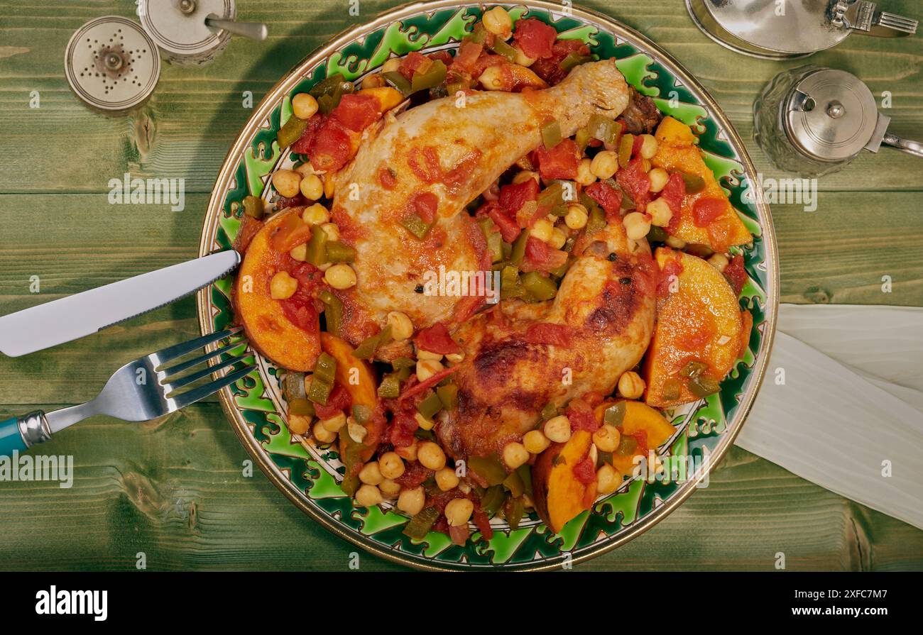 Chicken legs baked in a tomato and basil sauce with chick peas and ...