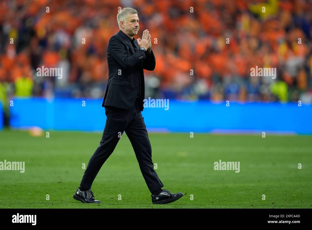 Romania's head coach Edward Iordanescu gestures at the end of a round ...
