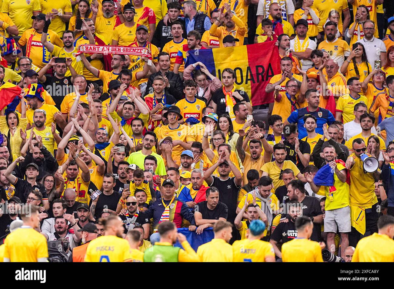 MUNICH, GERMANY - JULY 2: Fans of Romania cheering with their team ...