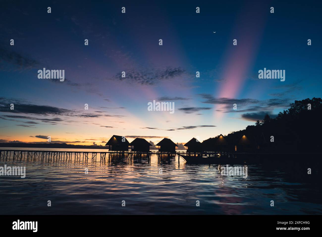 Sunrise on Kri island, Raja Ampat, West Papua Stock Photo - Alamy