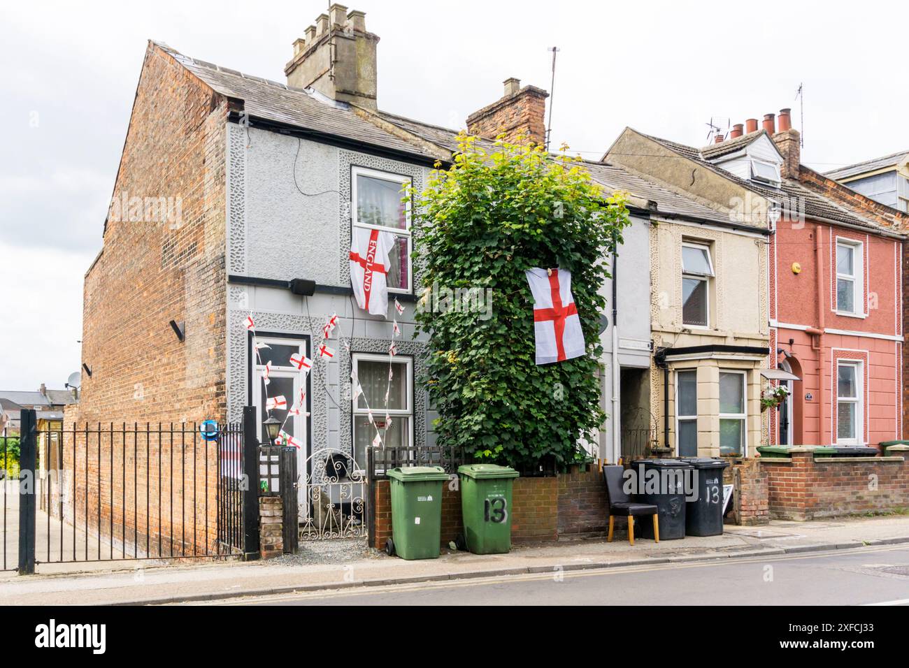 A house in King's Lynn decorated with St George cross flags to support ...