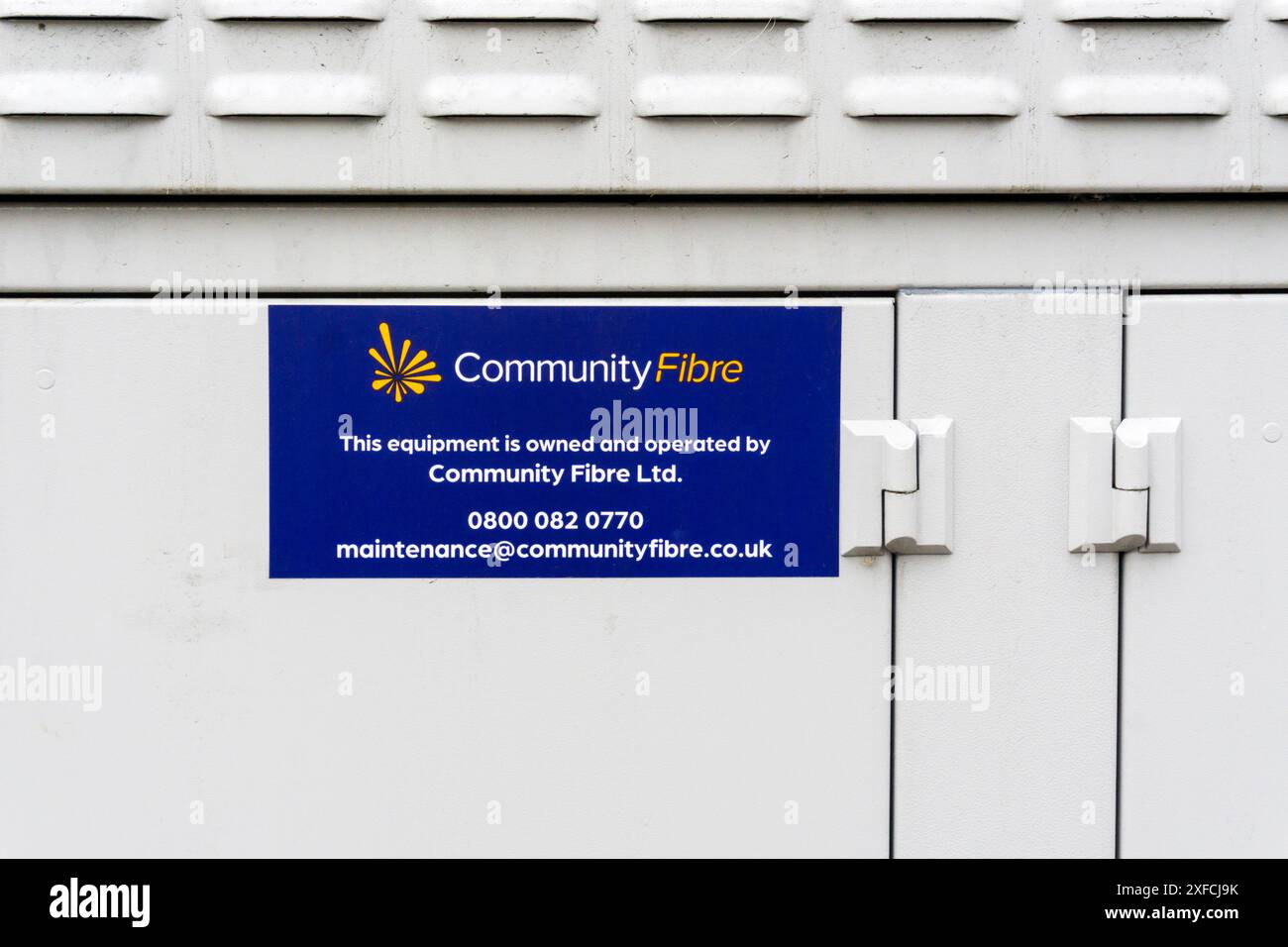 Label on a fibre broadband equipment street cabinet owned and operated ...
