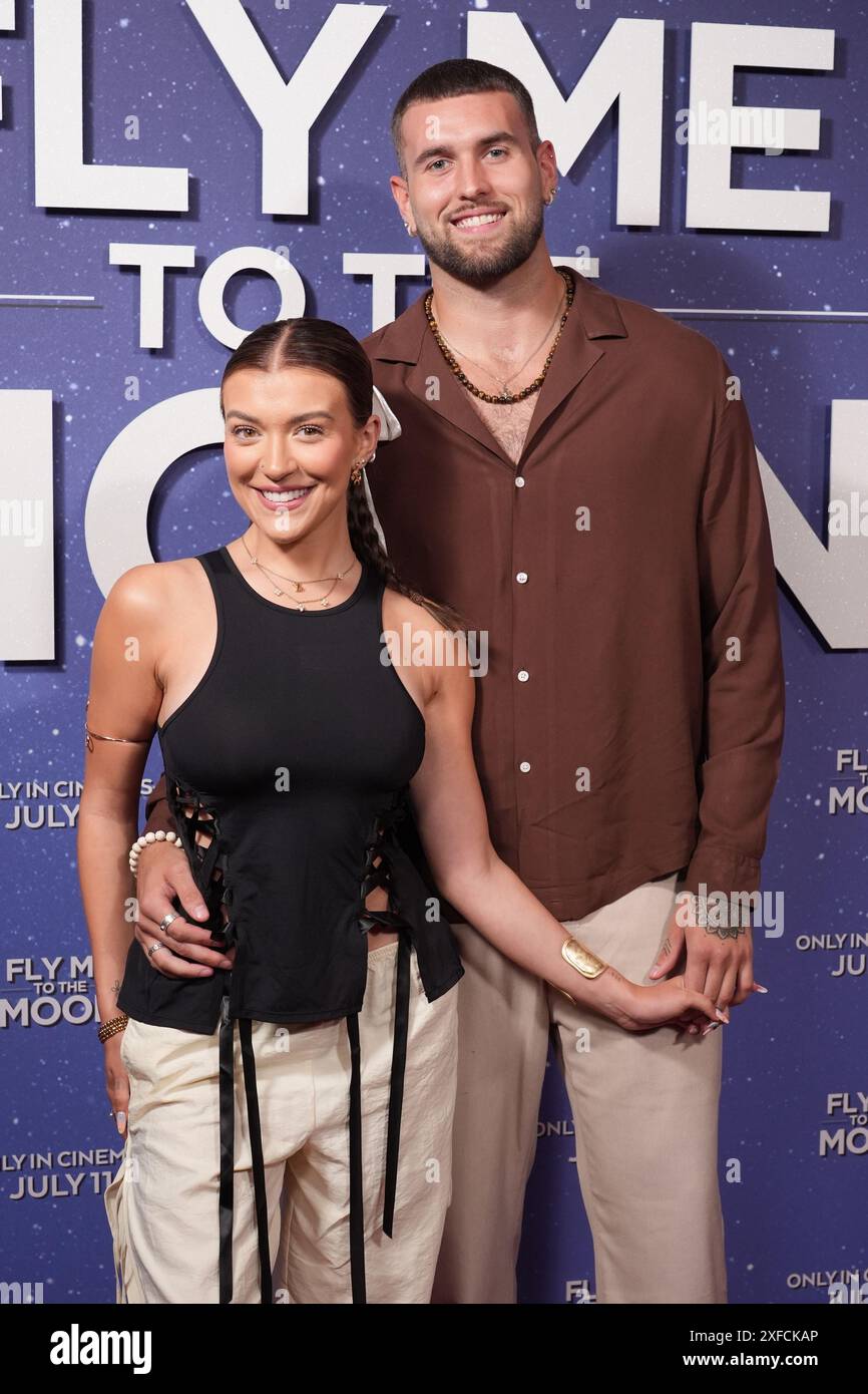 Zachariah Noble and Molly Marsh attend the gala screening of Fly Me to ...