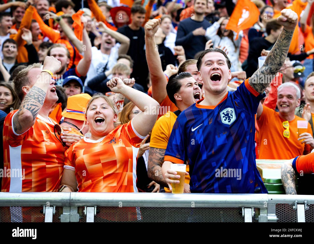 MUNICH - Dutch fans watch the eighth final match at the European ...