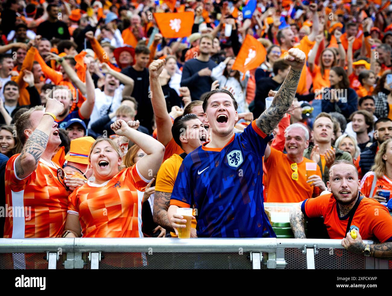 MUNICH - Dutch fans watch the eighth final match at the European ...