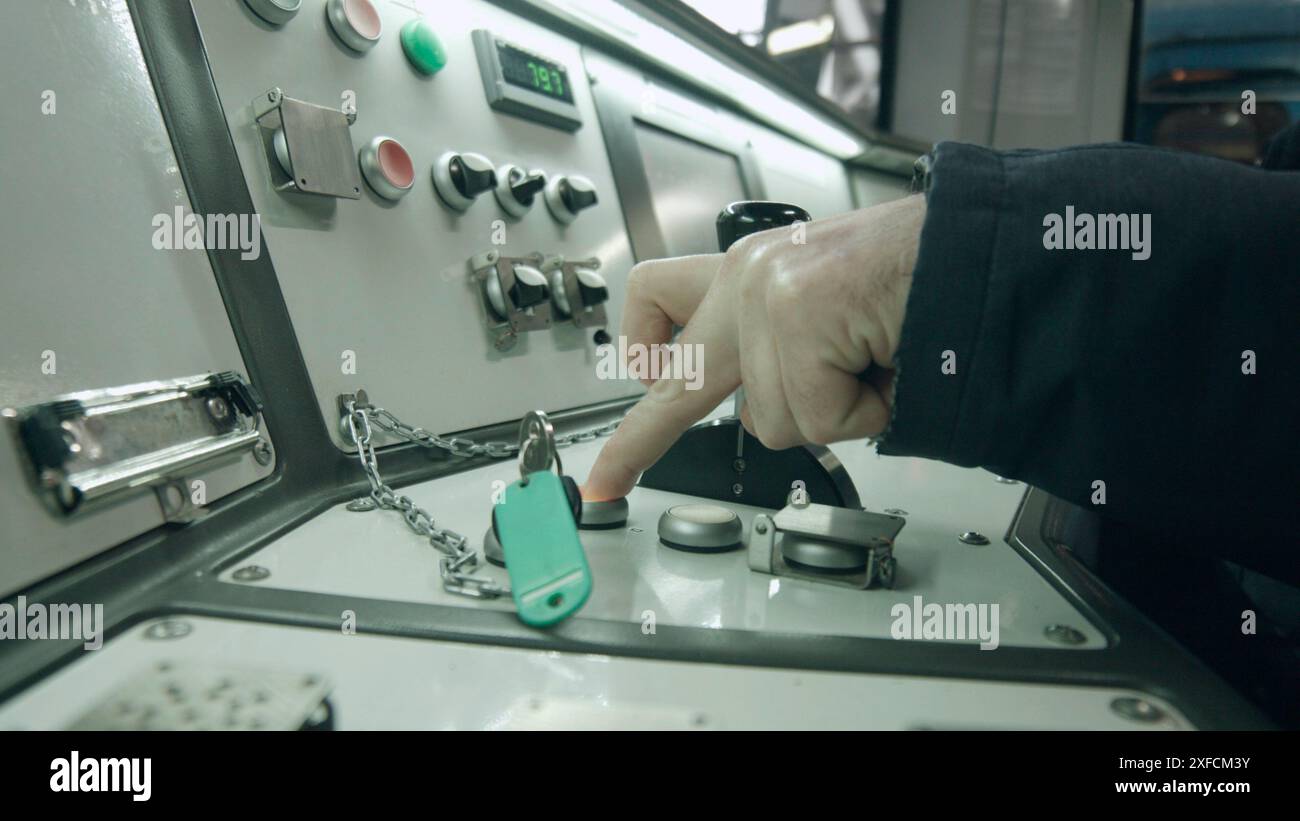 The train driver presses the button. Metro train control panel Stock ...