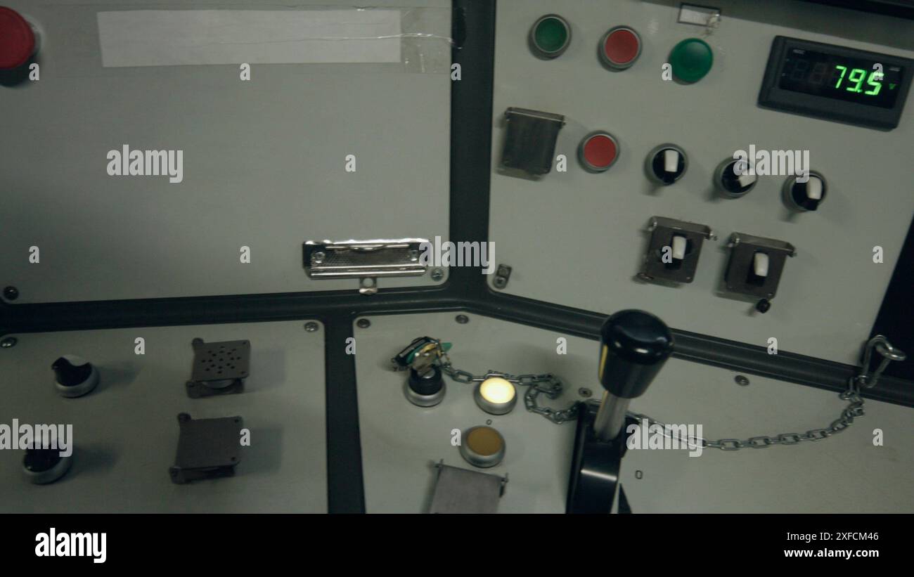 Driver's cab of the metro train. Train control panel Stock Photo - Alamy