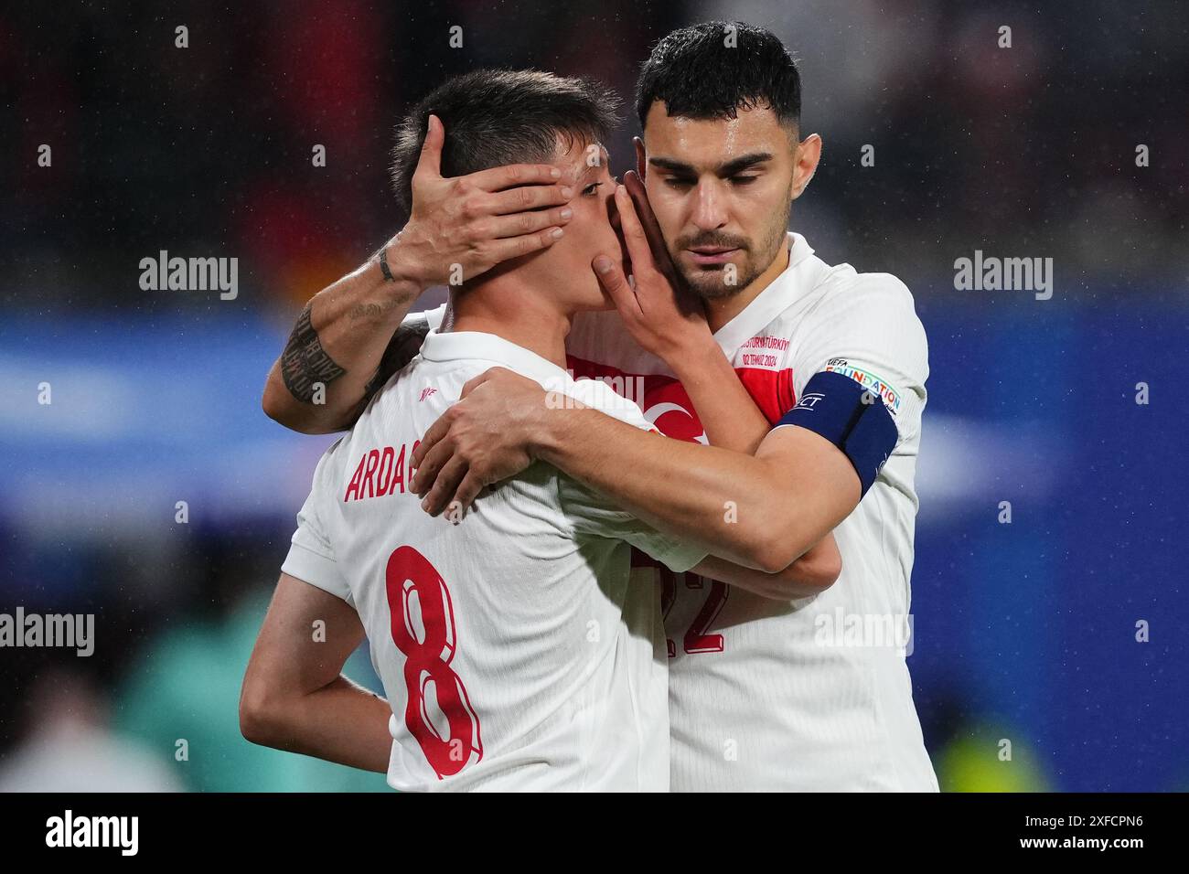 Leipzig, Germany. 02nd July, 2024. Arda Guler with Kaan Ayhan of ...