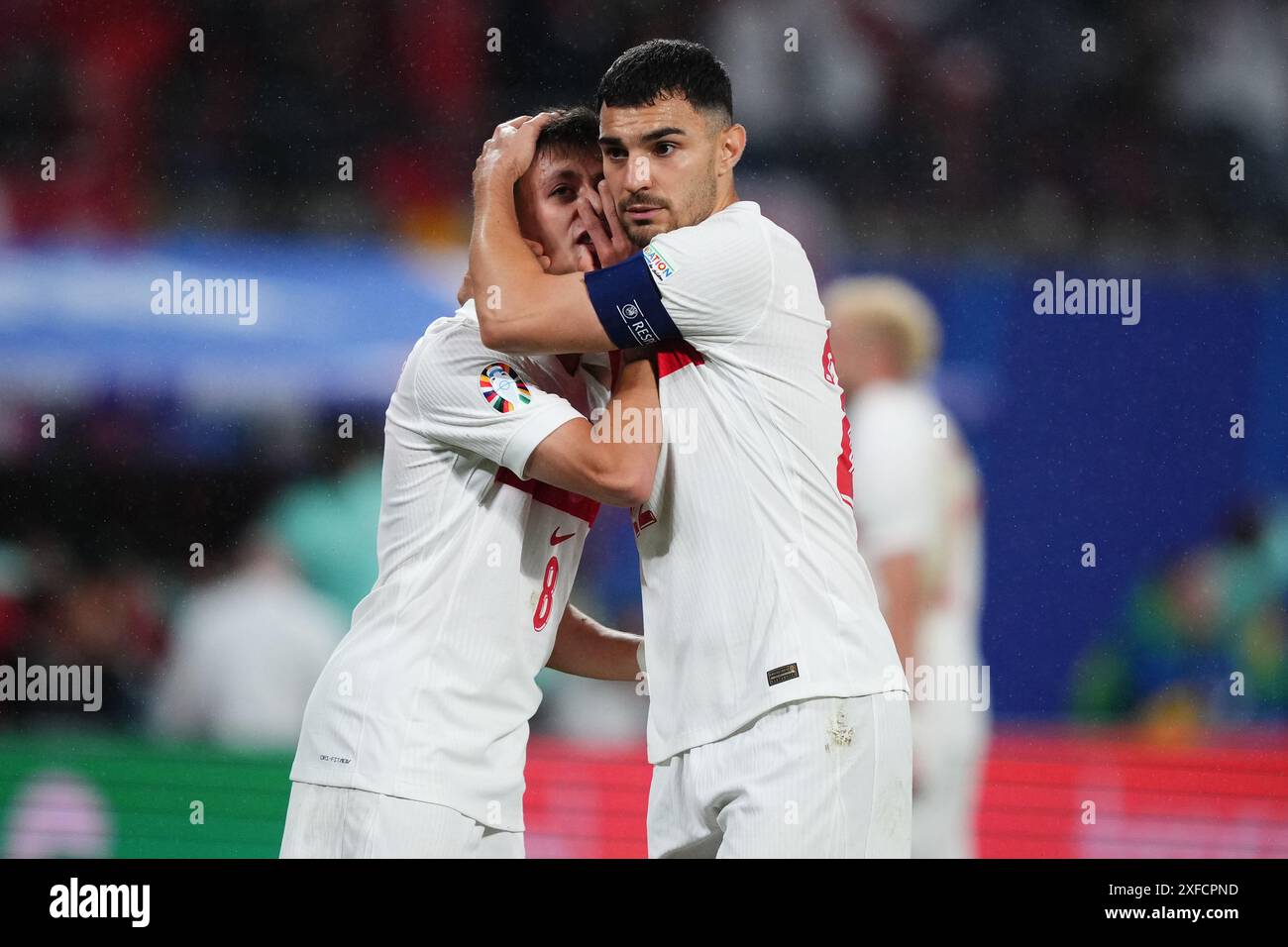 Leipzig, Germany. 02nd July, 2024. Arda Guler with Kaan Ayhan of ...