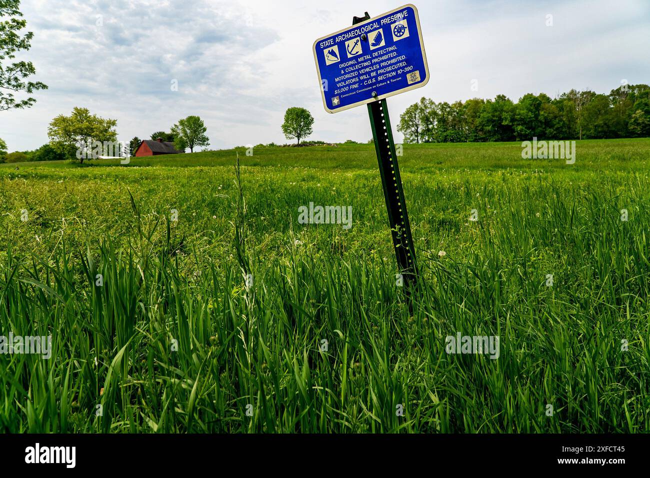 Sign prohibits metal detecting, digging, and collecting within a ...