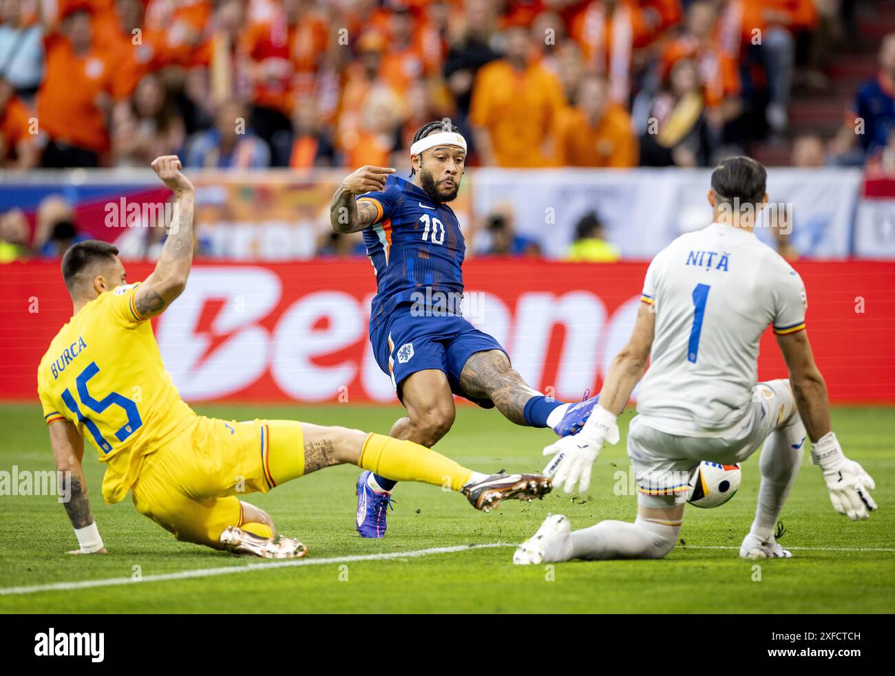 MUNICH - Andrei Burca of Romania, Memphis Depay of Holland and Romania ...