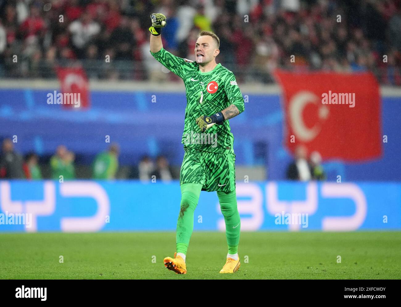 Turkey goalkeeper Mert Gunok salutes the fans following the UEFA Euro ...