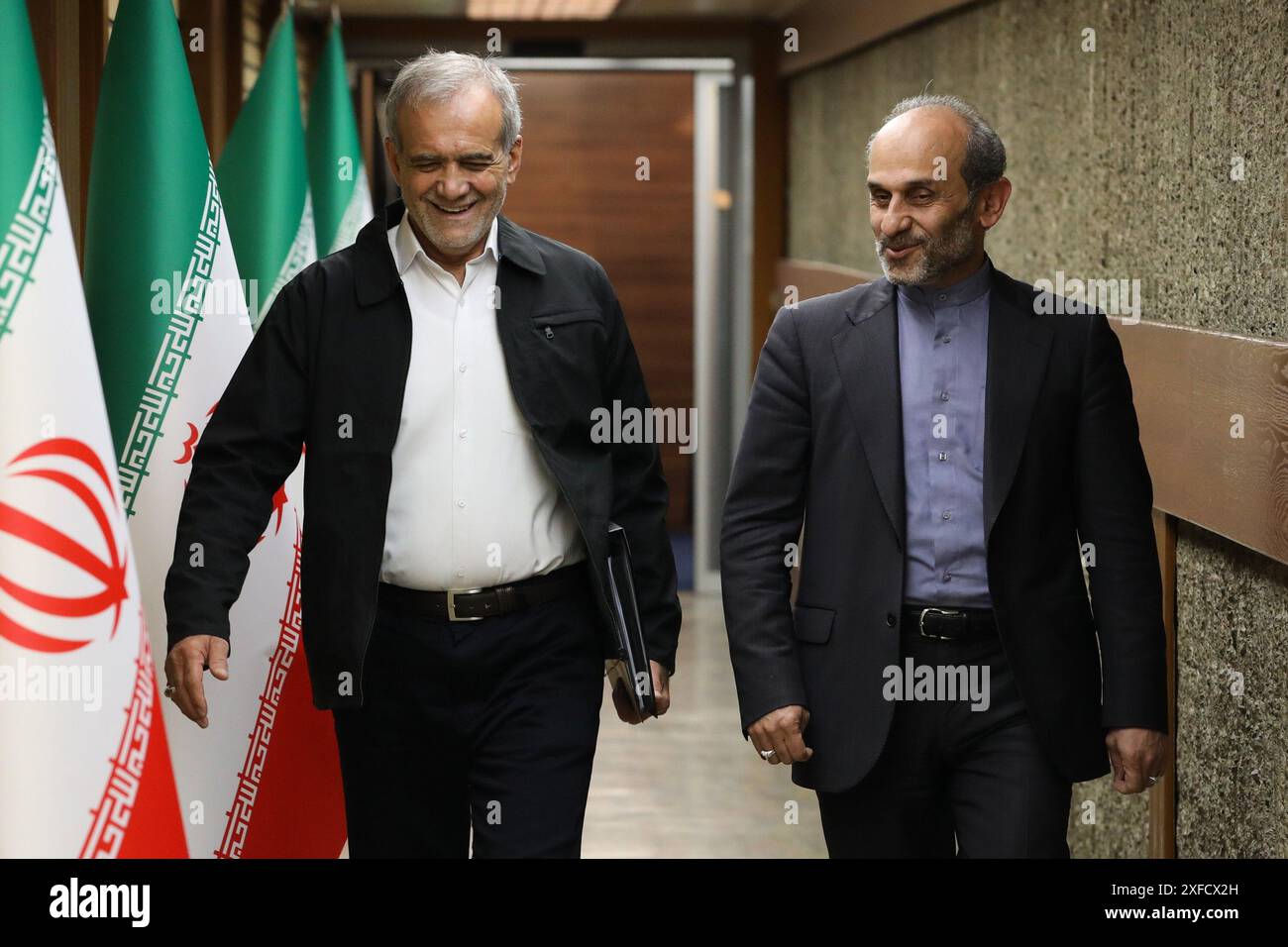 Tehran, Iran. 3rd July, 2024. Reformist candidate MASSOUD PEZESHKIAN (L ...