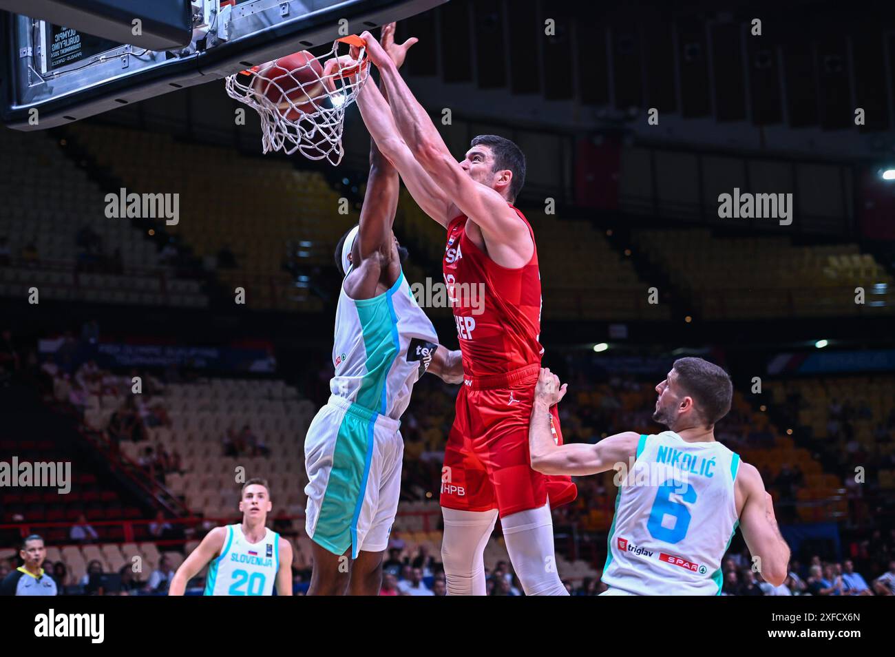 22 Danko Brankovic of Croatia competing with 9 Josh Nebo of Slovenia ...