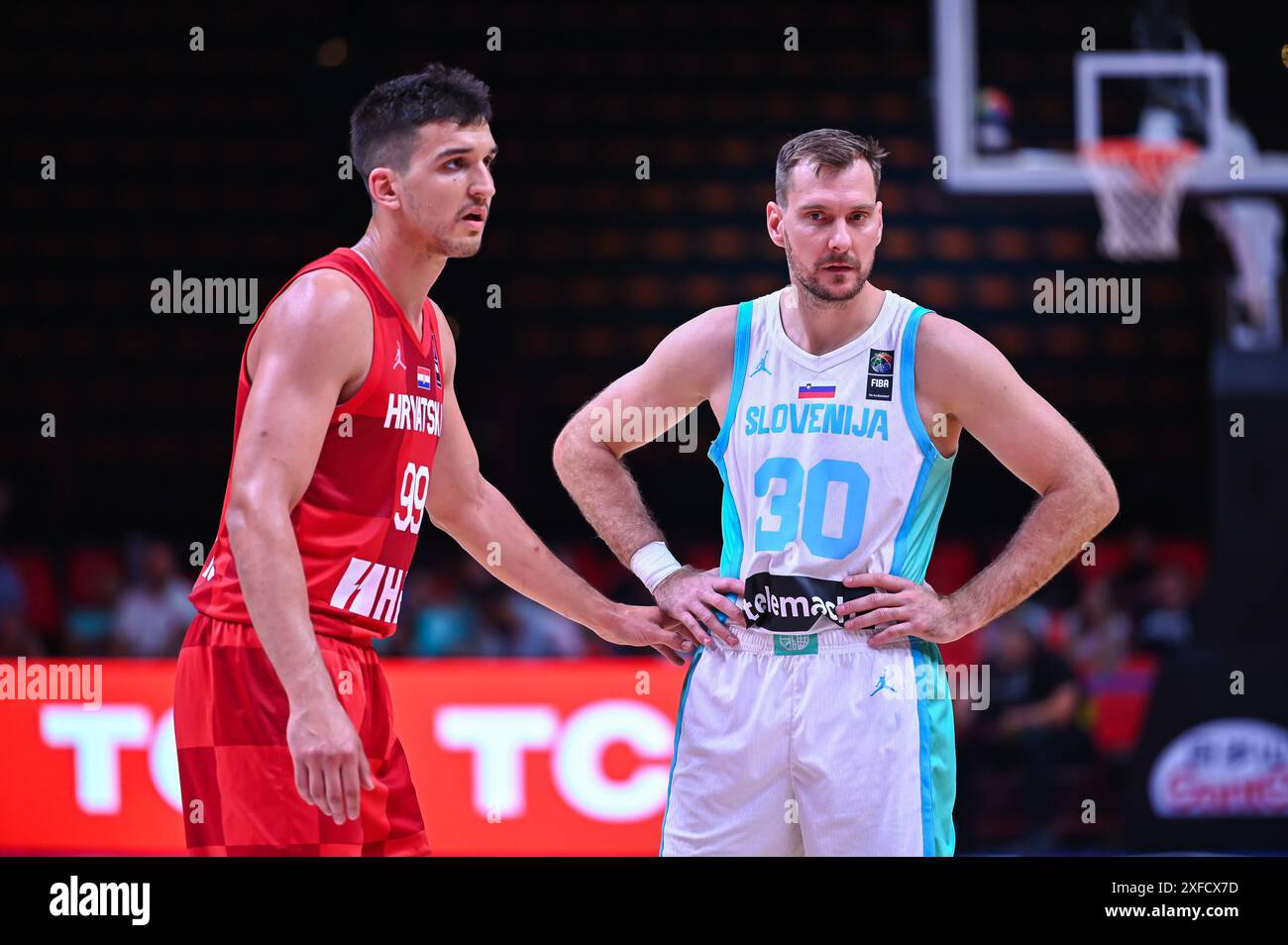 30 Zoran Dragic of Slovenia competing with 99 Toni Nakic of Croatia ...