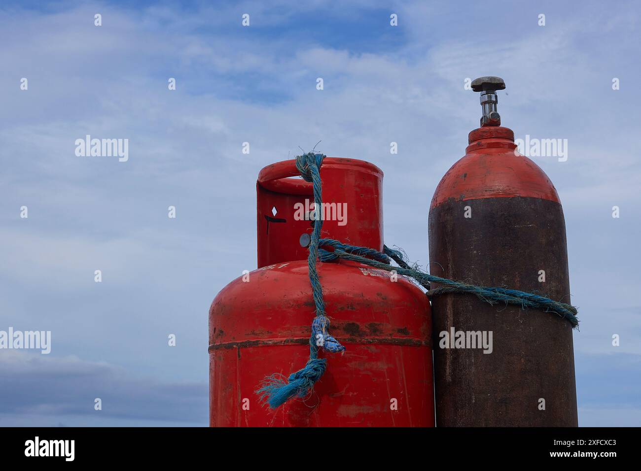metal cylinders for metal welding, red Stock Photo - Alamy