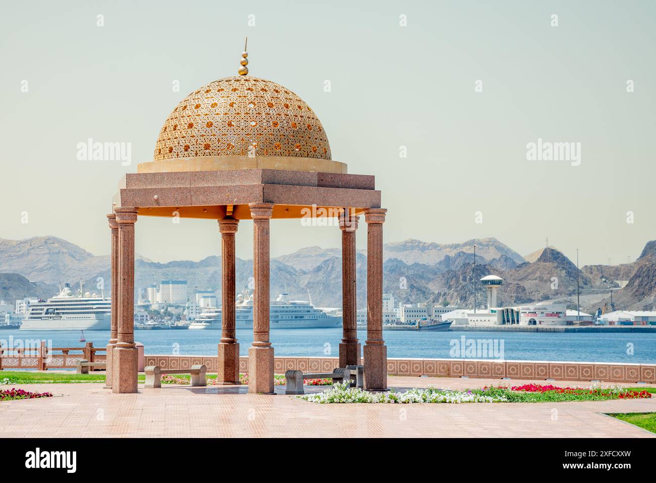 Golden ornated dome gazebo in traditional Omani style with port and ...