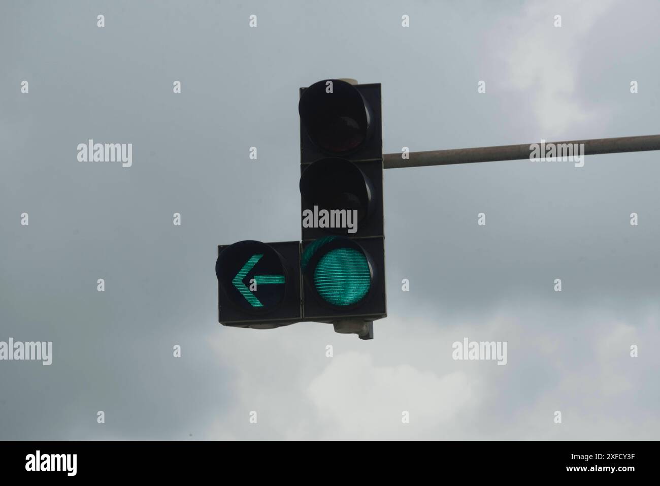 green traffic light signal on the street, symbol for going green ...