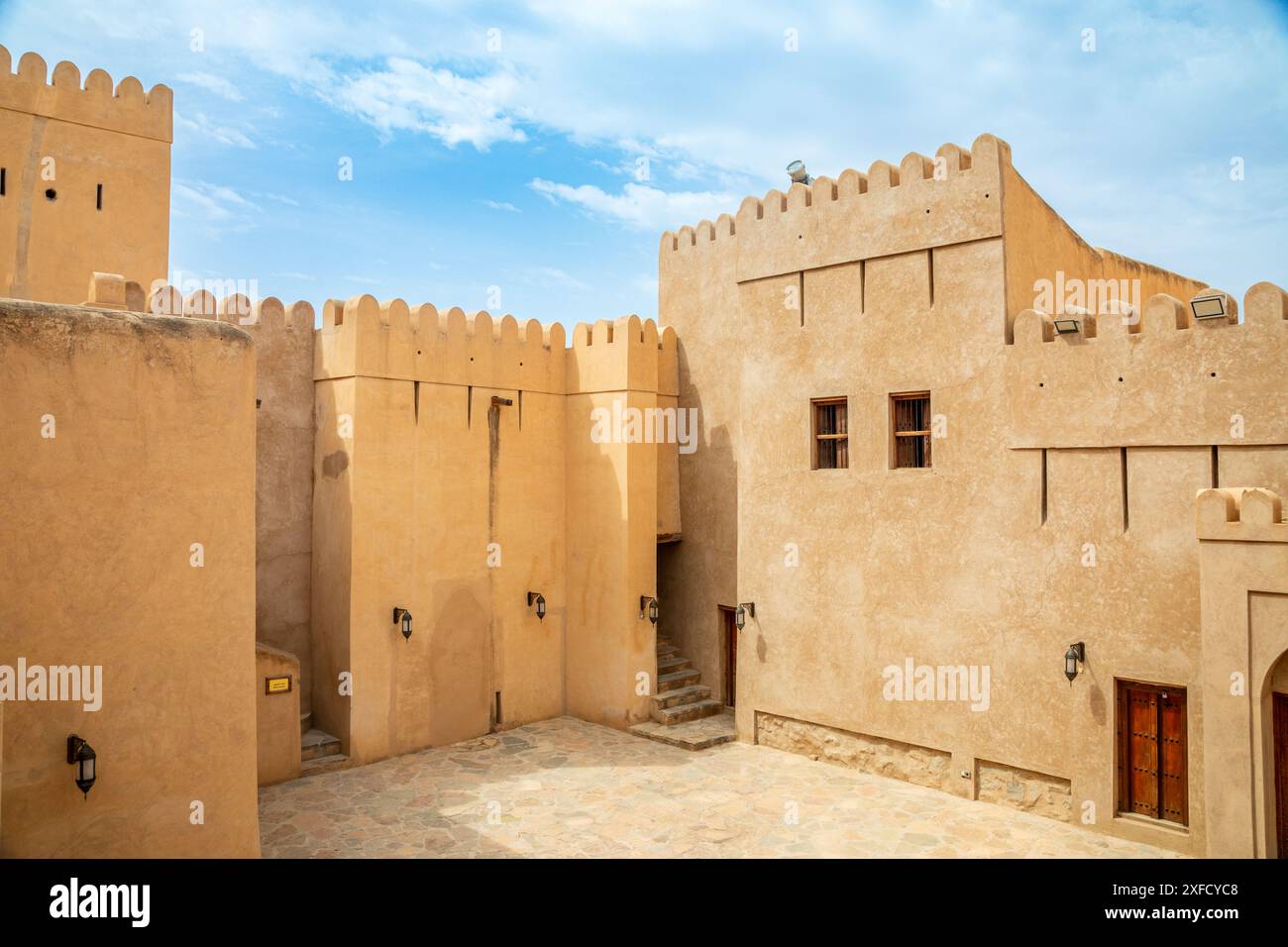 Arabic citadel fortress inner yard stairs, towers and walls with ...