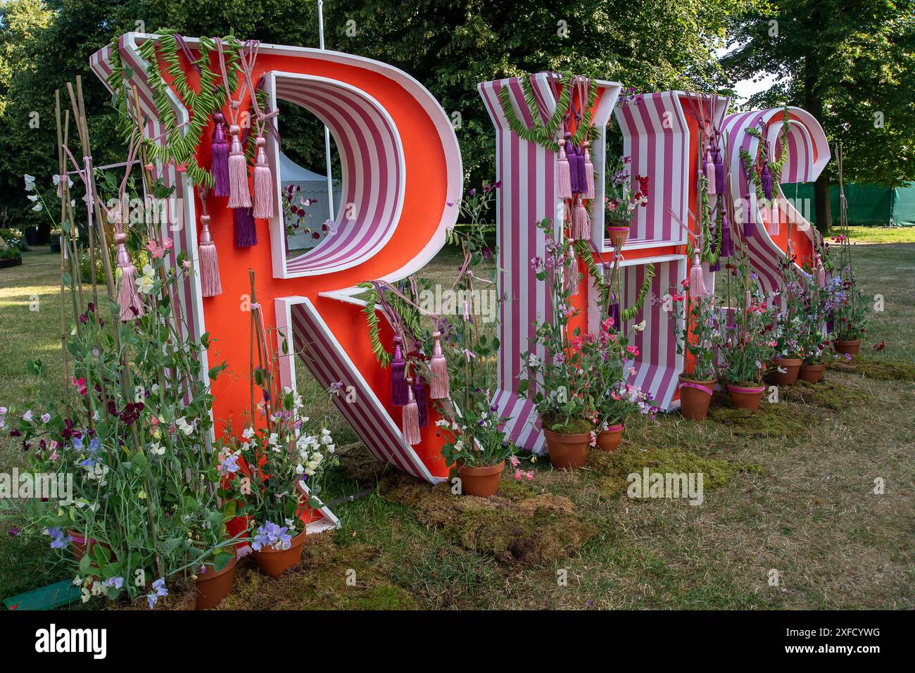 East Molesey, Surrey, UK. 1st July, 2024. Giant RHS lettering dressed ...