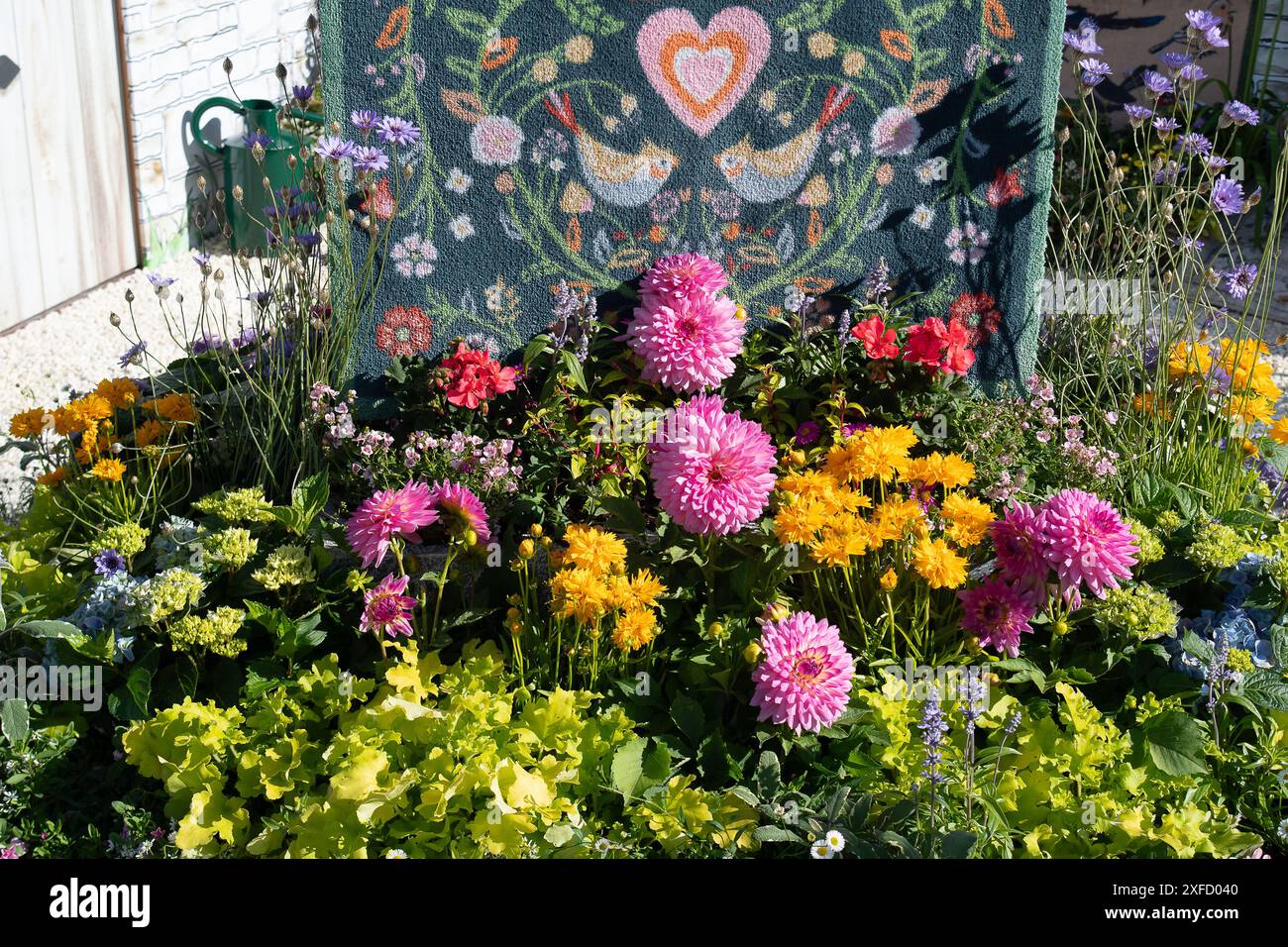 East Molesey, Surrey, UK. 1st July, 2024. The Hug Rug stand at the RHS ...