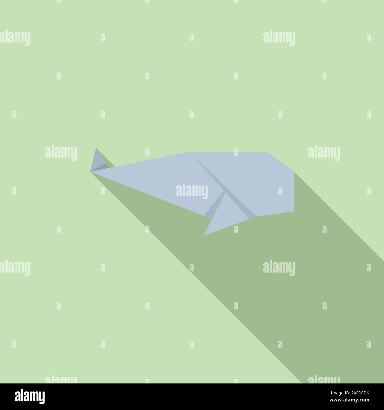 Simple origami whale folded from blue paper casting a long shadow Stock ...