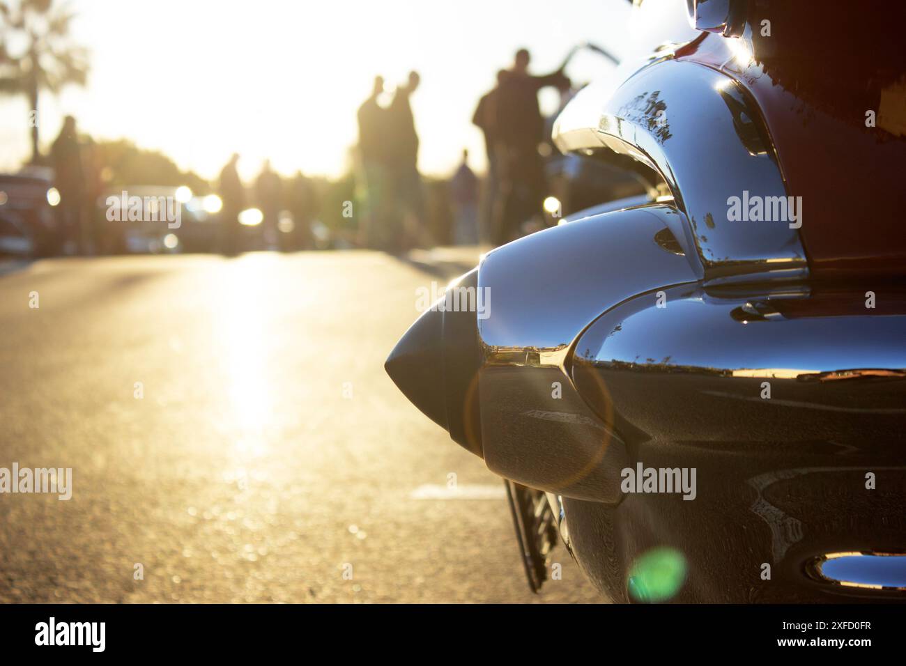 The front bumper of a classic, '57 Chevy stands prominent in the ...