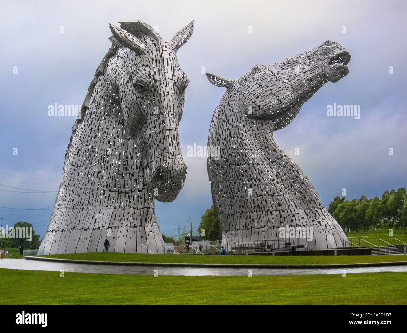The Kelpies. A pair of monumental steel horse-heads between the ...