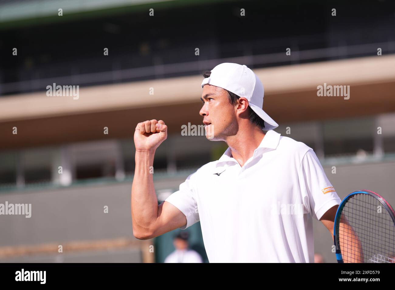LONDON, ENGLAND - JULY 02: Taro Daniel of Japan in action in the Men's ...