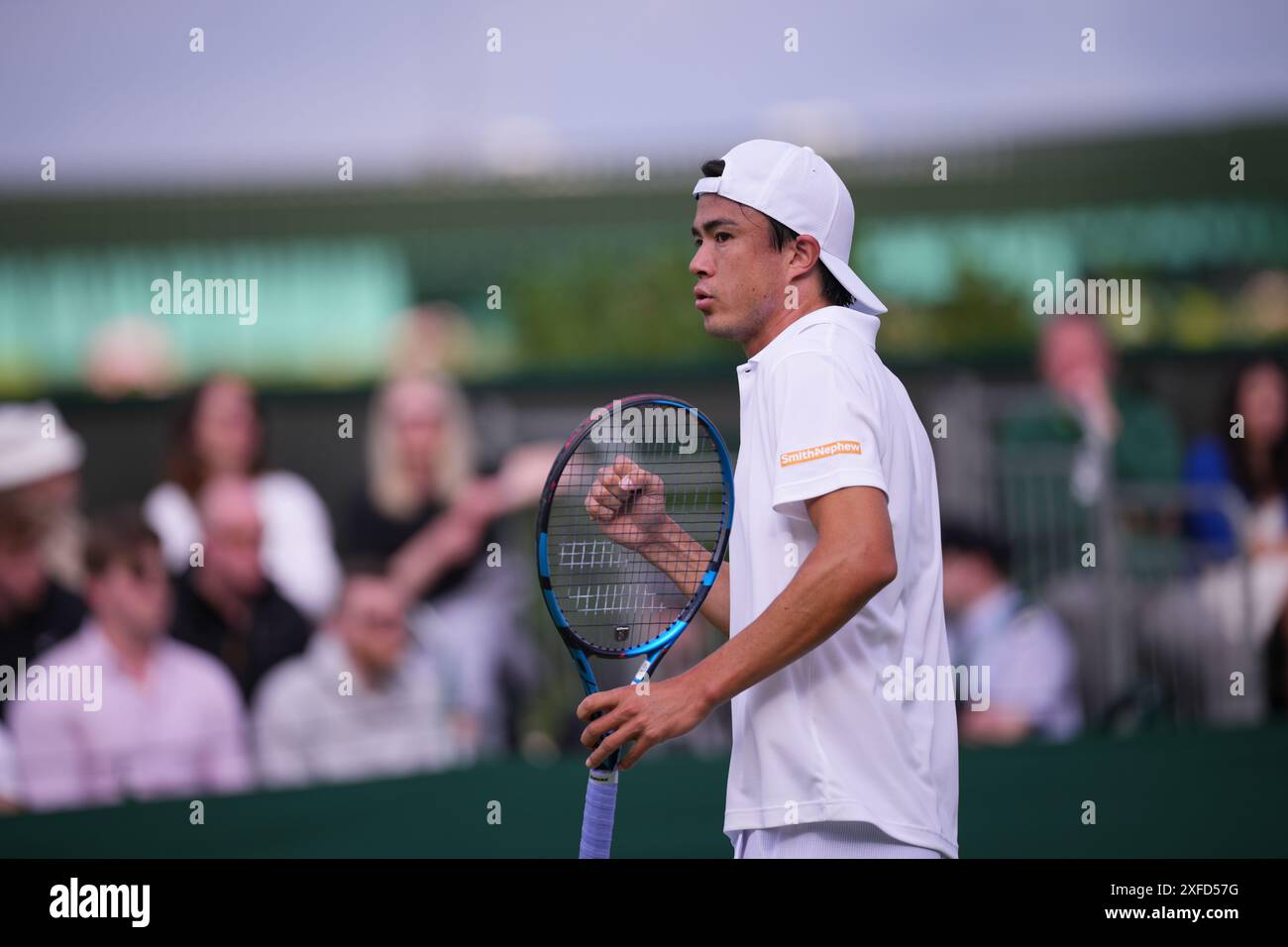 LONDON, ENGLAND - JULY 02: Taro Daniel of Japan in action in the Men's ...