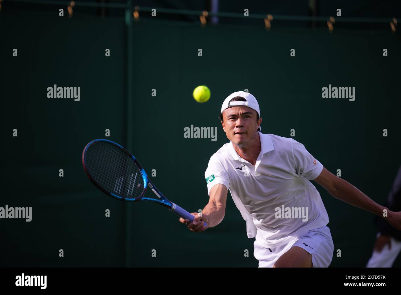 LONDON, ENGLAND - JULY 02: Taro Daniel of Japan in action in the Men's ...