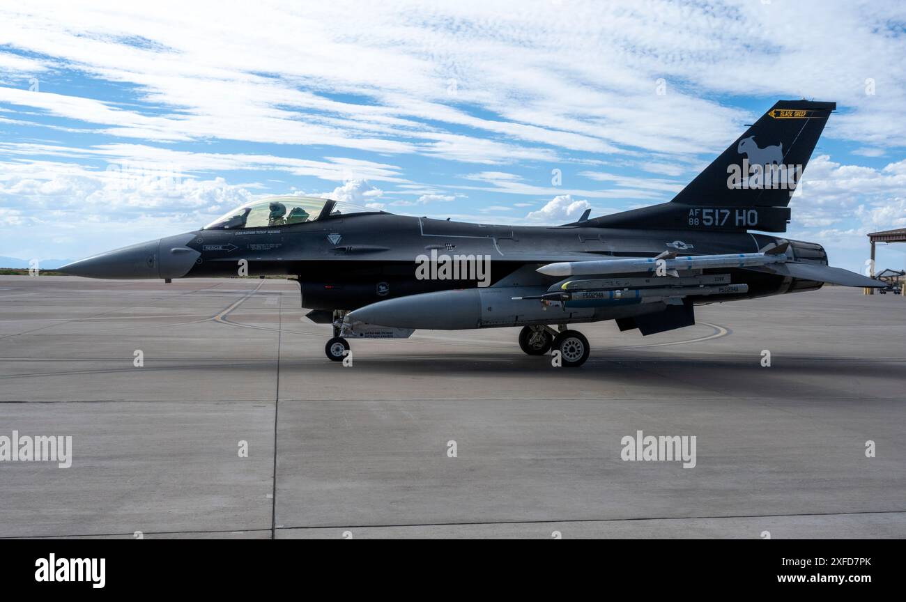 An F-16 Viper assigned to the 8th Fighter Squadrons waits on a runway ...