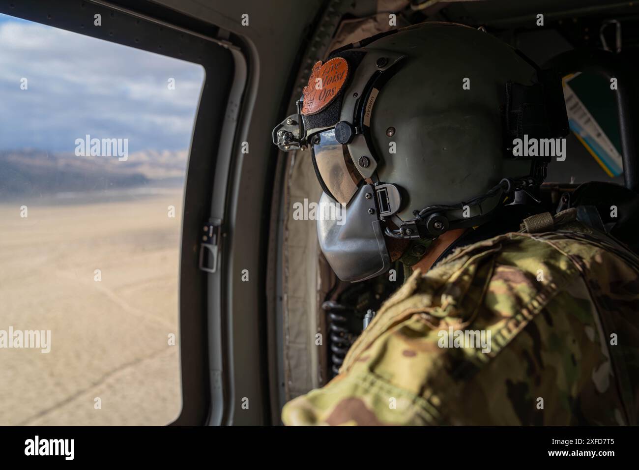U.S. Army Spc. Prentice Urban, a crew chief assigned to Charlie Company ...