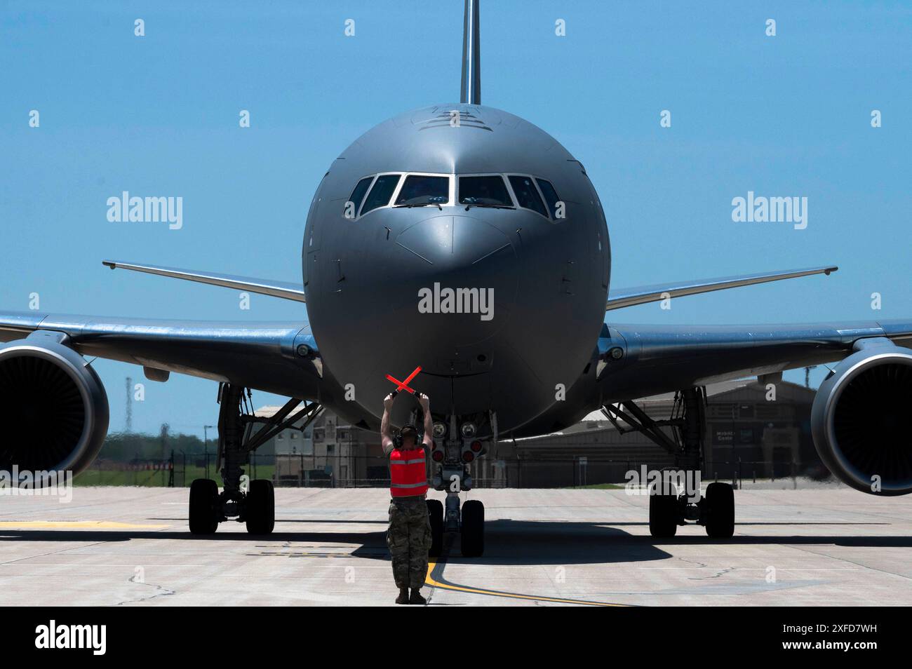 McConnell Airman marshals the KC-46A Pegasus at McConnell Air Force ...