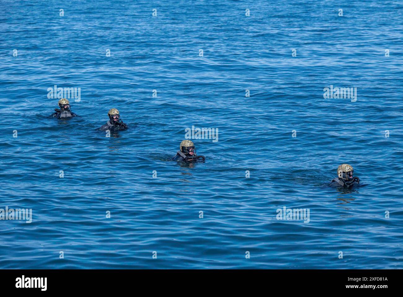 West Coast-based Naval Special Warfare (NSW) operators conduct military ...