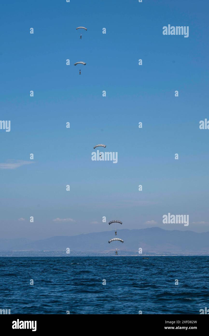 West Coast-based Naval Special Warfare (NSW) operators perform a ...