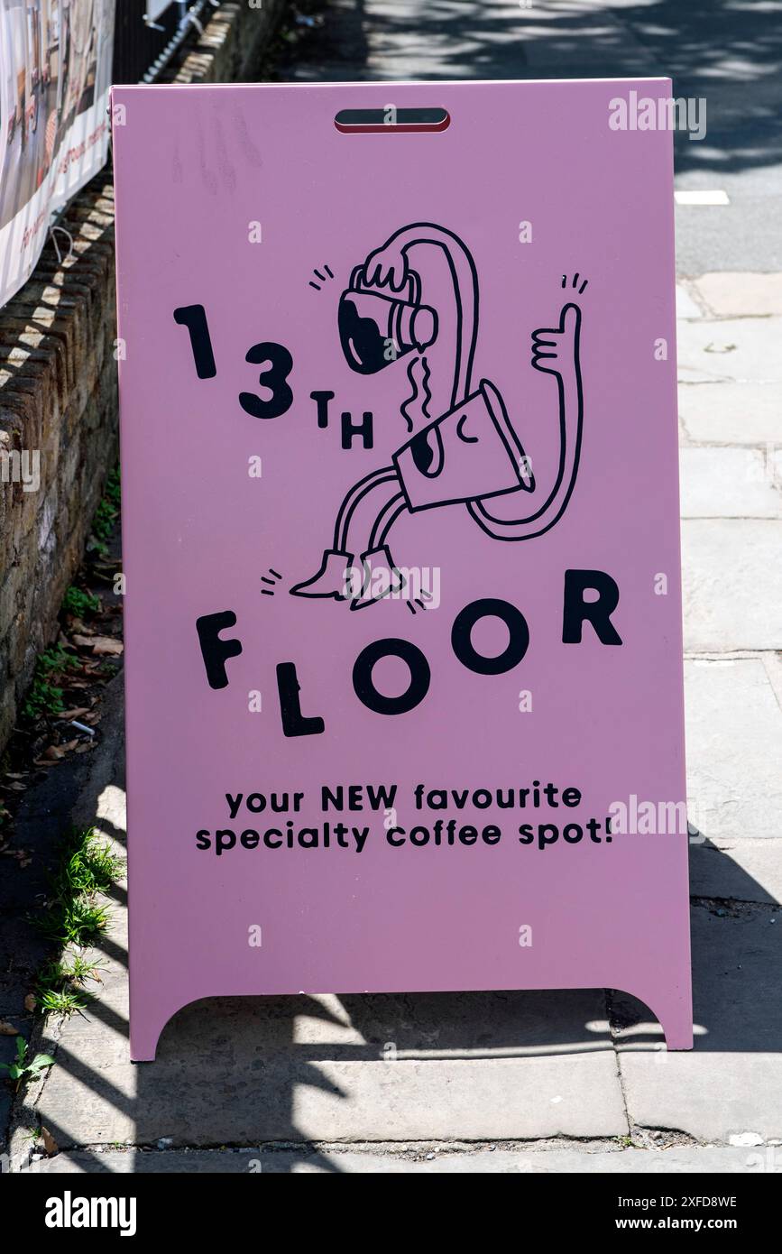 Pink placard advertising the 13th Floor coffee van at Christ Church ...