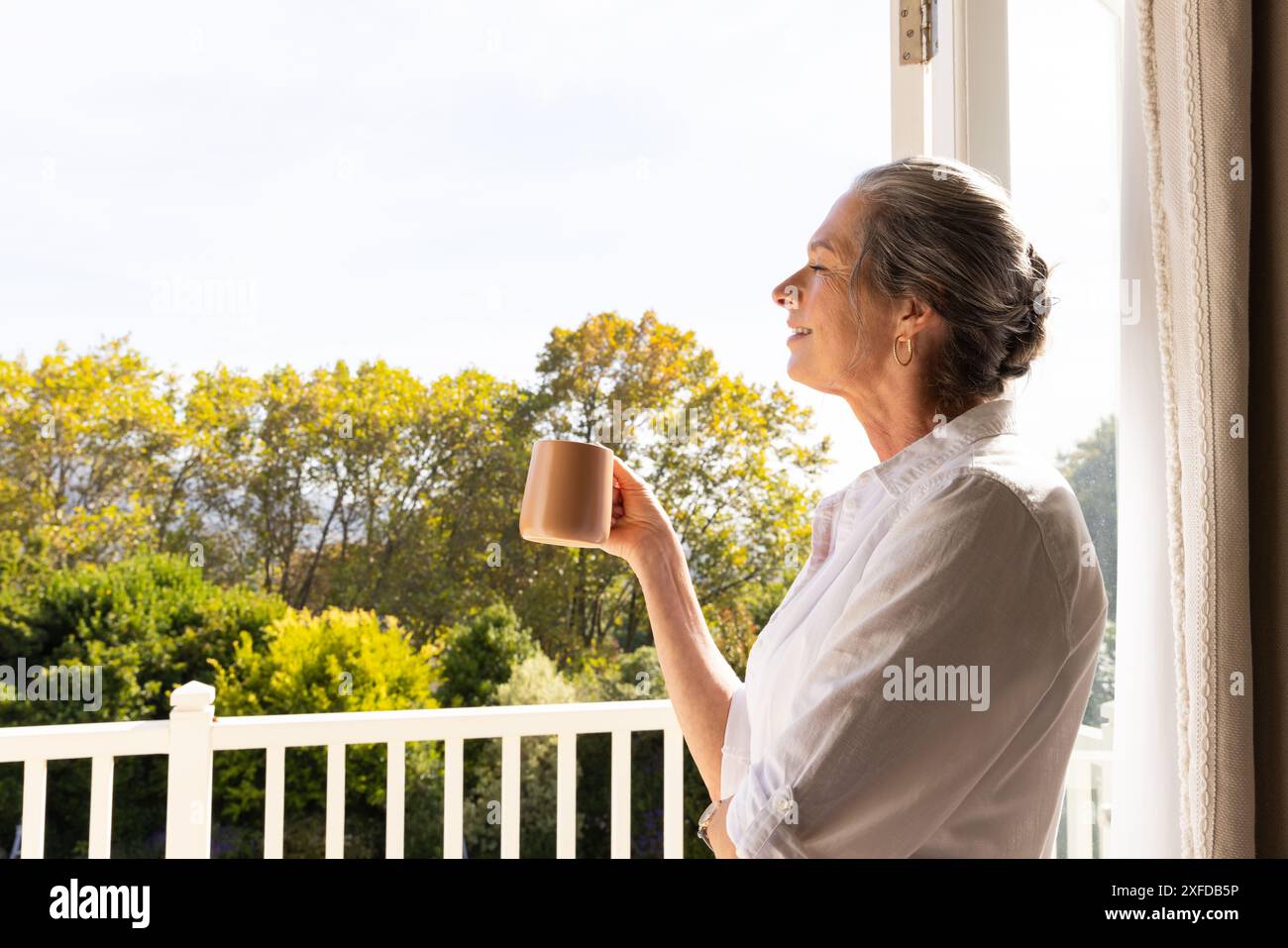 Mature woman enjoying view hi-res stock photography and images - Alamy