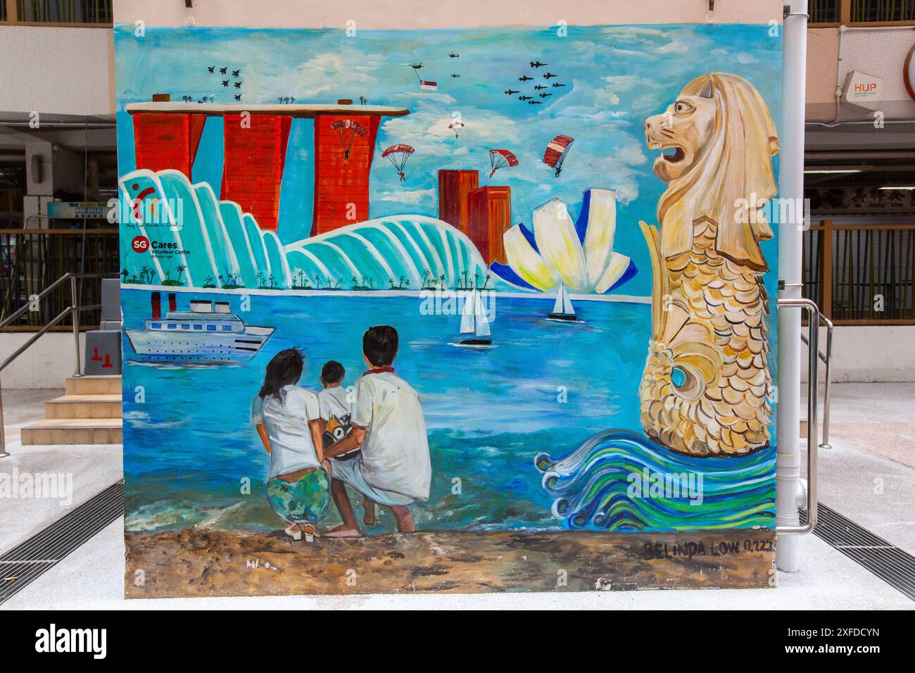 Wall mural of a family watching National Day Parade, painted by local ...