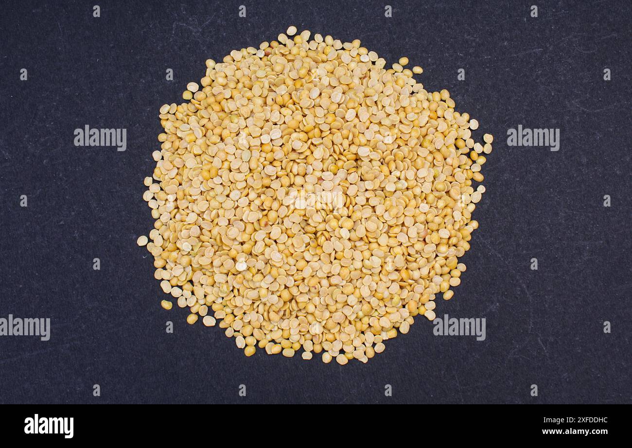 Toor dal or arhar dal on black background close-up view Stock Photo - Alamy