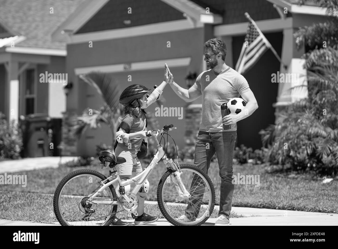 Father and son child sharing biking adventure. father and son navigate ...