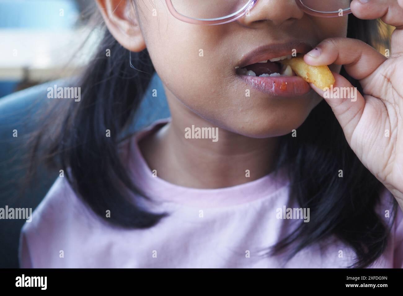 Kid hand french fries hi-res stock photography and images - Alamy